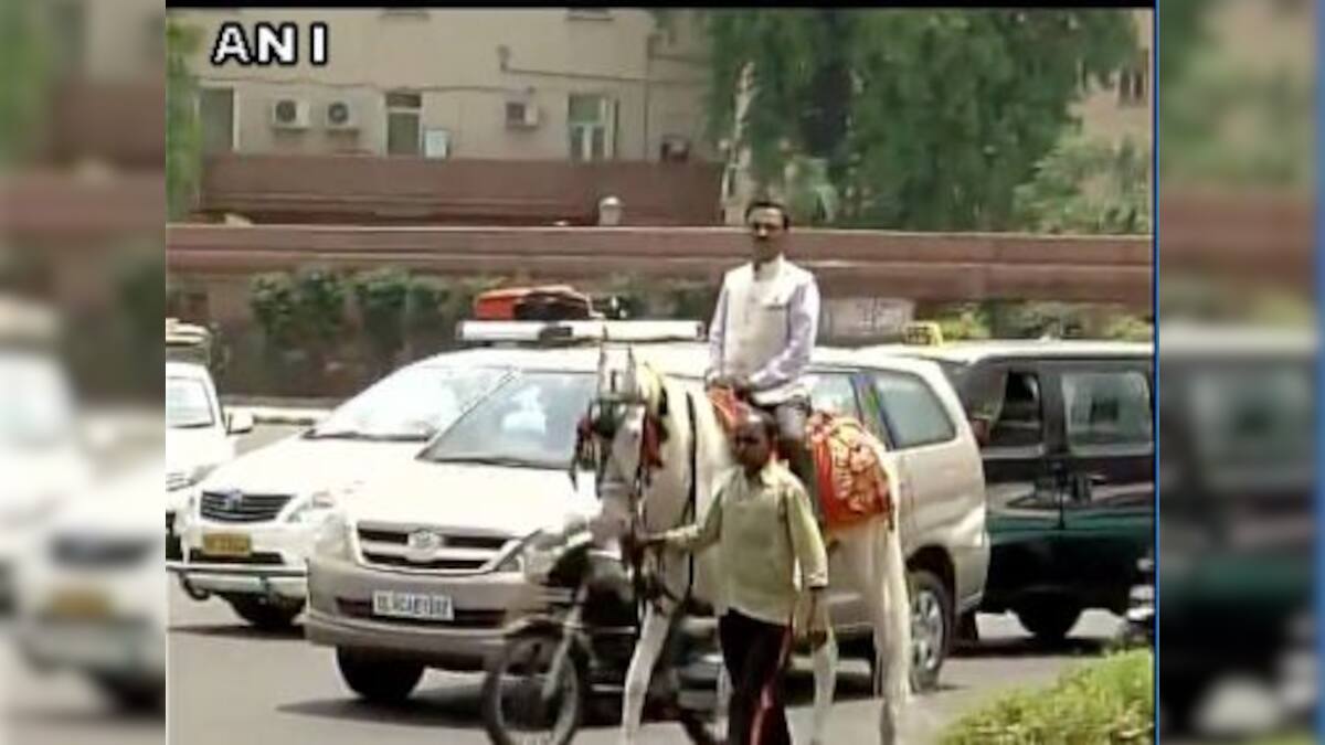 Pollution-free: BJP MP cycles to Parliament, another rides a horse ...