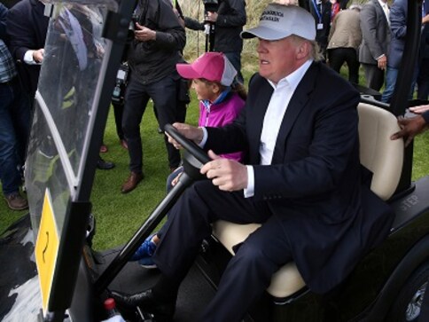 Stop the hating: Protesters storm Donald Trump's golf course in ...