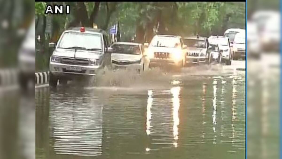 Rains continue to lash Delhi, Gurugram; road outside India Gate caves ...