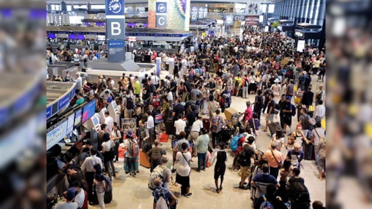 Delta Air Lines shutdown strands more than 1,000 people at Japan's ...
