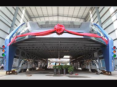 Transit Elevated Bus: China completes first test of bus that travels ...