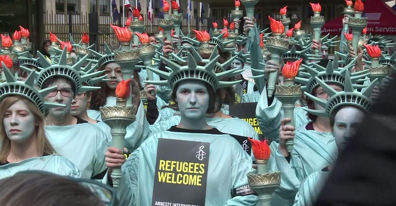 Watch: 100 'Statues of Liberty' protest against US President Donald ...