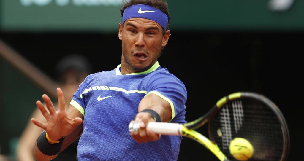 French Open 2017: Rafael Nadal storms into fourth round with one-sided ...