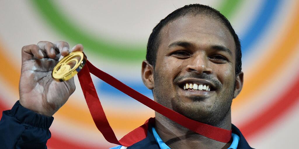 S Sathish Kumar, R V Rahul win gold at Commonwealth weightlifting ...