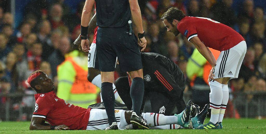 Manchester United's Paul Pogba could be out for weeks after injury in ...
