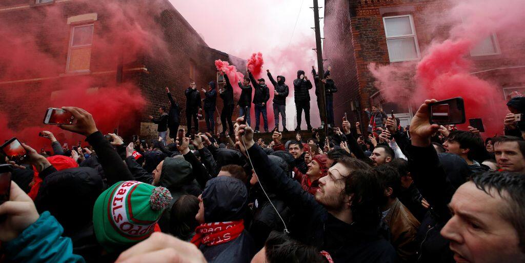 Premier League: Liverpool fans can celebrate title later but won't be ...