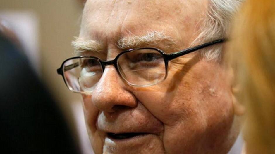 Apple should spend more cash buying its own shares, says Berkshire ...