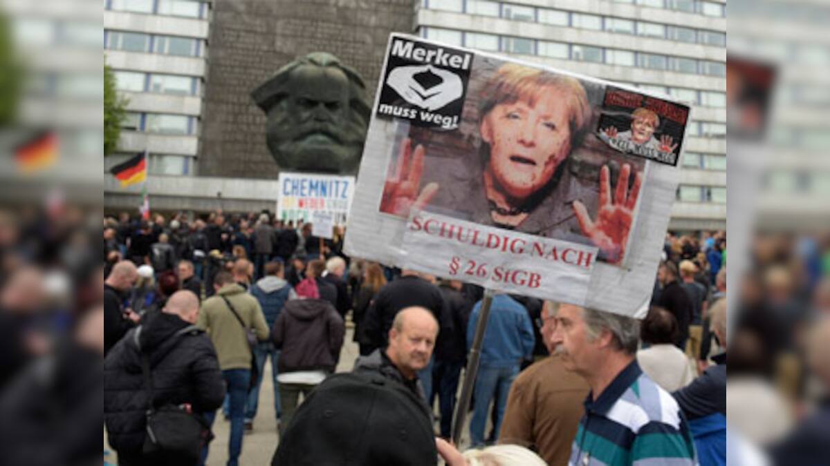 Germany protest: Thousands of supporters, opponents of Angela Merkel's ...