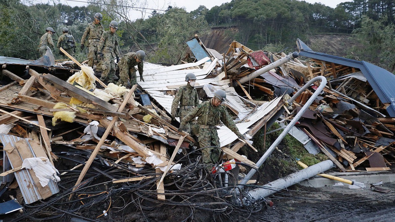 Japan Earthquake Toll Rises To 30 As Rescuers Dig Through Landslides 9