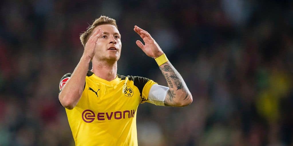 Bundesliga: Borussia Dortmund rue missed chances after being held to ...