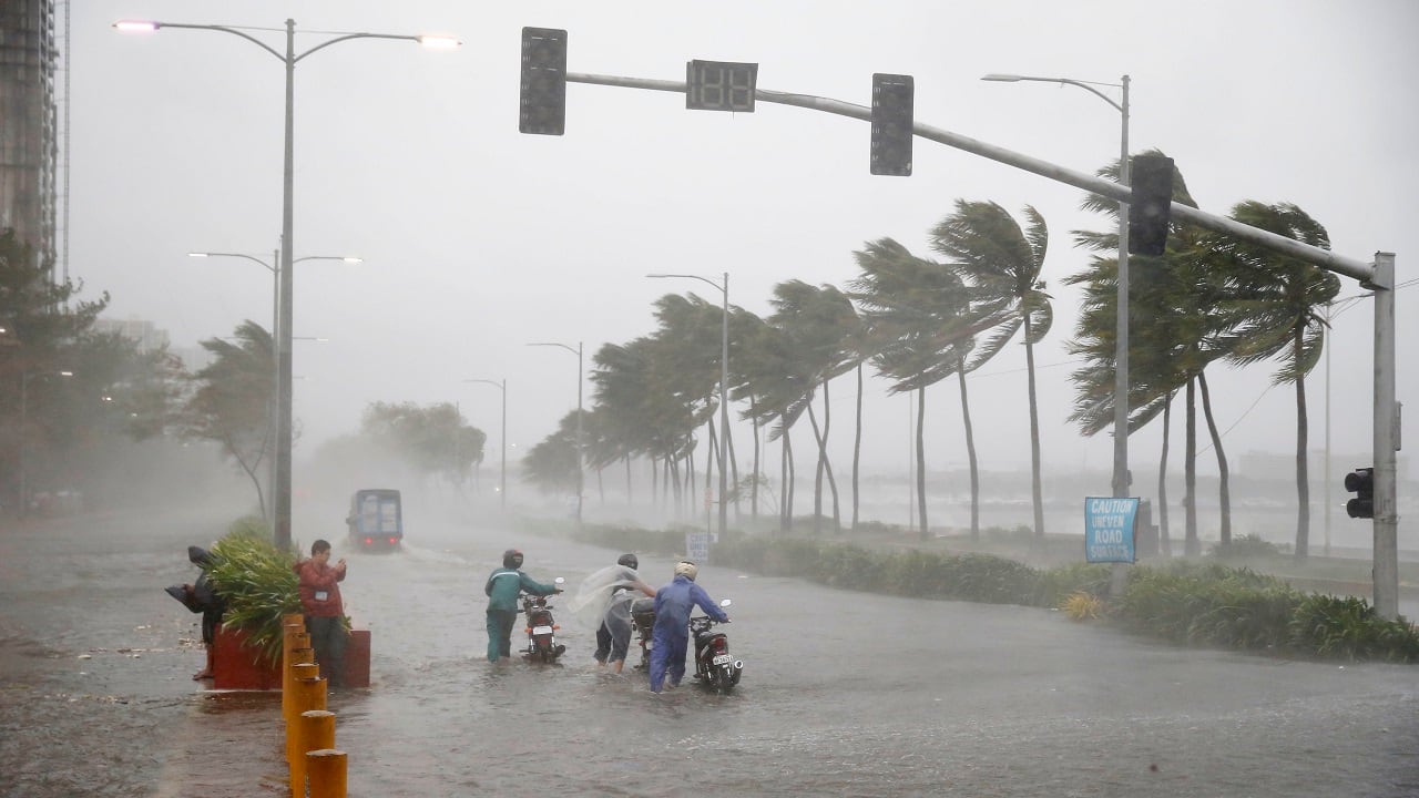 Typhoon Mangkhut: Two dead as storm batters Philippines; residents take ...