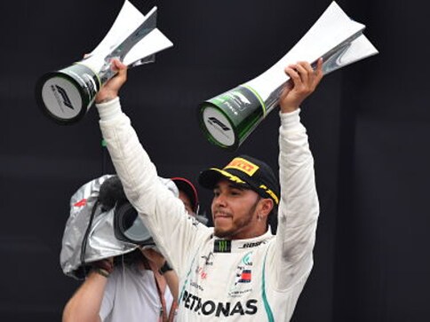 Brazilian Grand Prix: World champion Lewis Hamilton wins to hand ...
