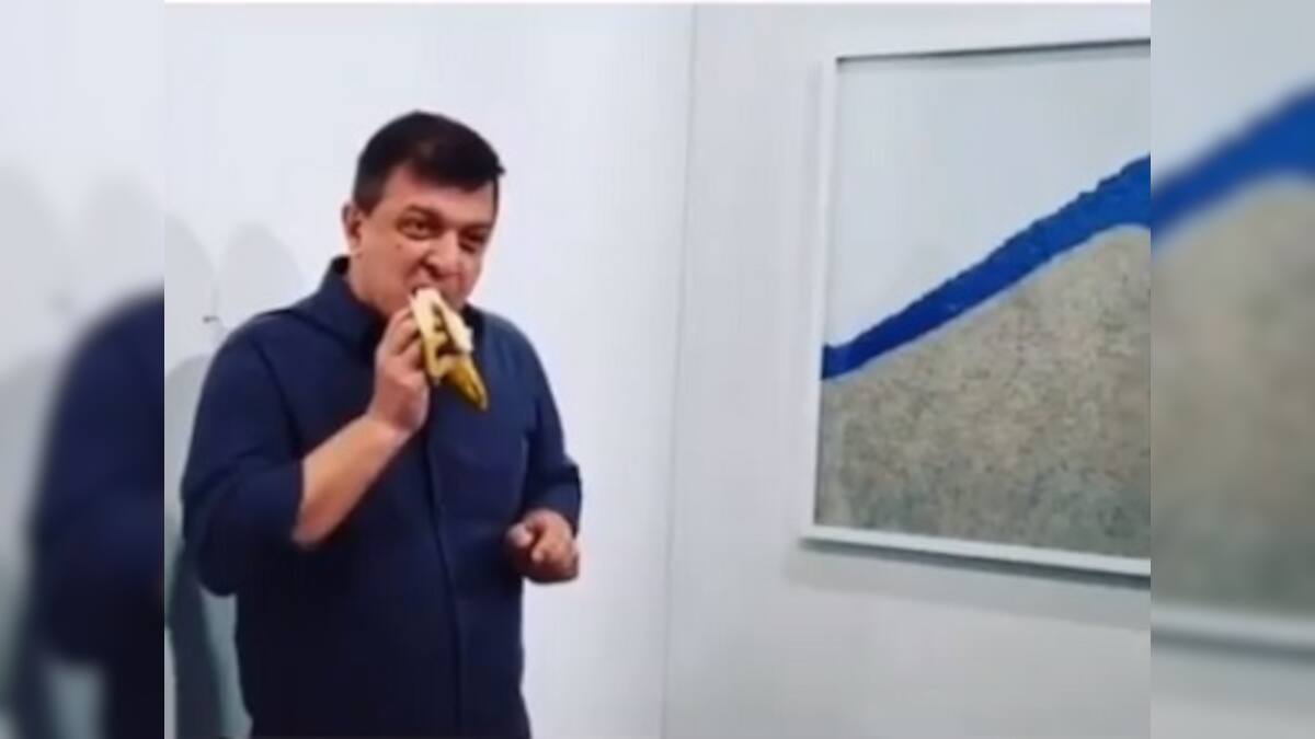 American artist David Datuna eats Art Basel Miami's duct-taped banana ...