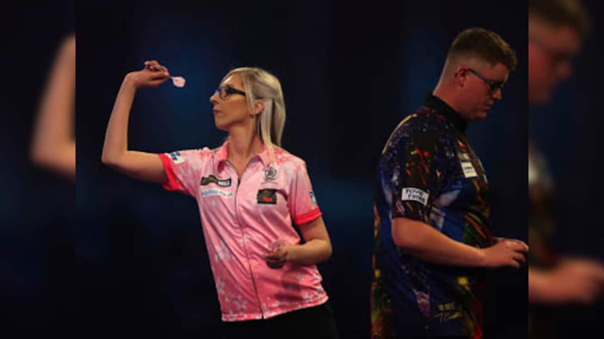 Trailblazing Fallon Sherrock becomes first-ever female darts player to ...