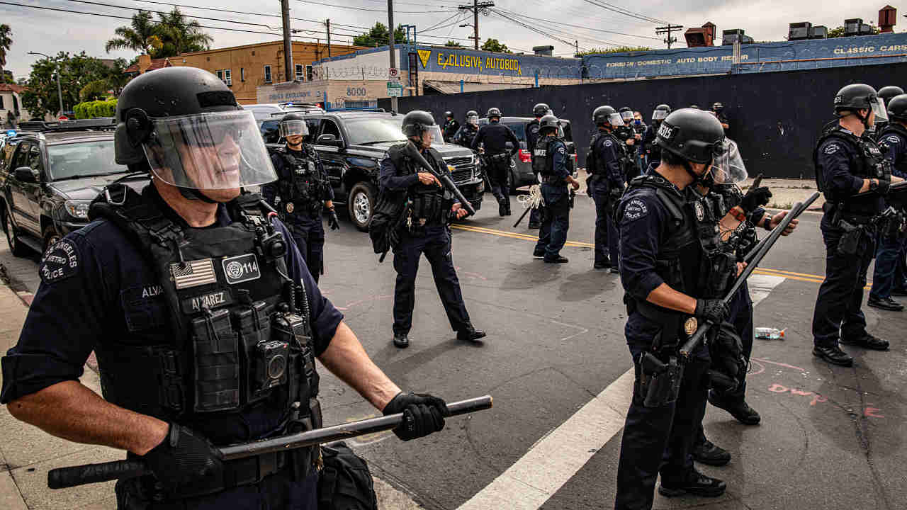 Police the public, or protect it? Crisis-stricken US can learn hard ...