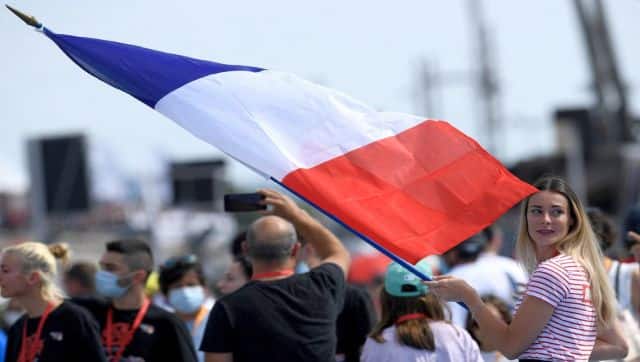 Two shades of blue: Emmanuel Macron makes subtle changes in French flag ...