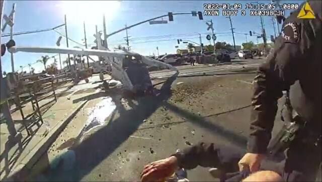 Caught on camera: Pilot rescued from debris of crashed jet in LA ...
