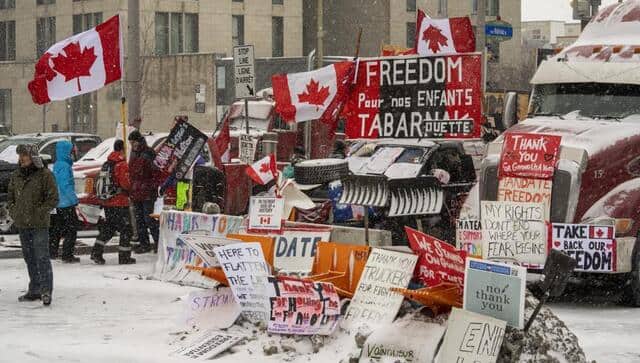 Canadian truckers protest: Standoff at Ambassador Bridge eases as ...