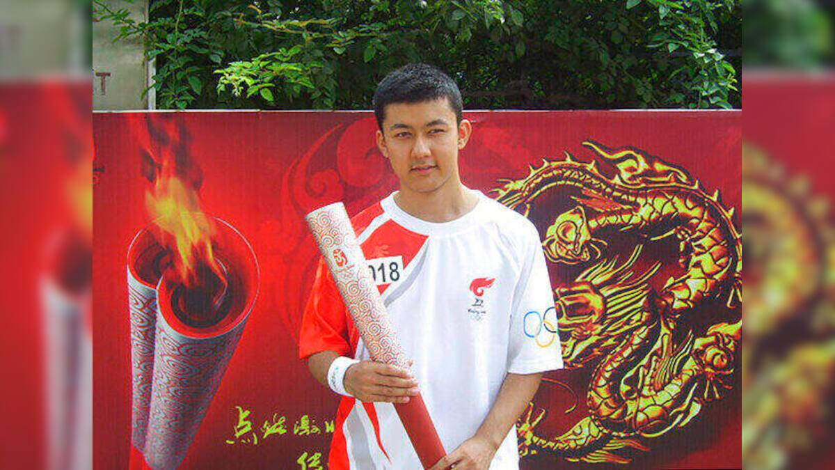 'Olympic flame doused': Chinese exile calls for boycott of Beijing ...