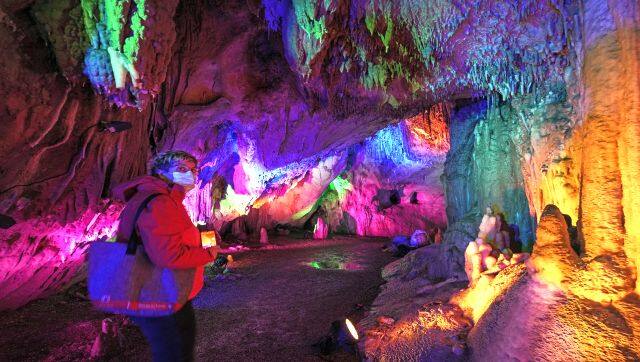 Red, pinks and blues! Illuminated Dechen Cave In Germany takes your ...
