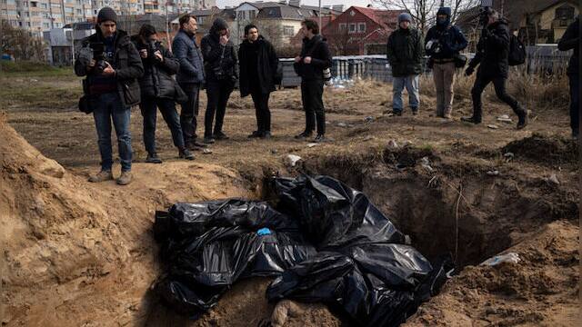 Spectral city: Russians leave behind trail of death in Bucha as they ...