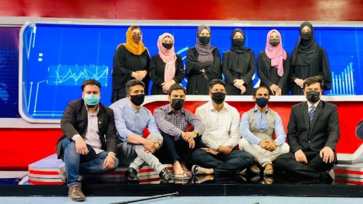 Explained: Why are male Afghan TV presenters masking up? – Firstpost