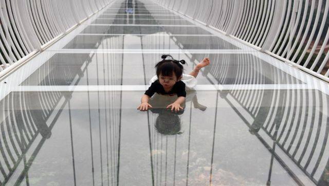 Don't look down! World's longest glass-bottomed bridge in Vietnam ...
