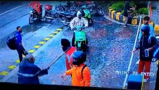 Watch: Raining blows on each other, food delivery guy and security ...
