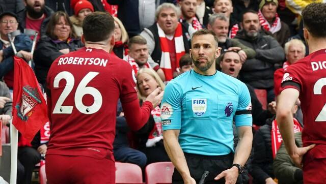 Watch: Liverpool's Andy Robertson gets elbowed in the face by assistant ...