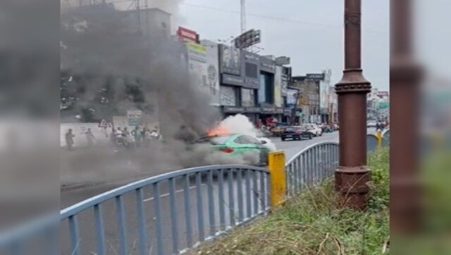 WATCH: BMW catches fire on busy Chennai road, video goes viral
