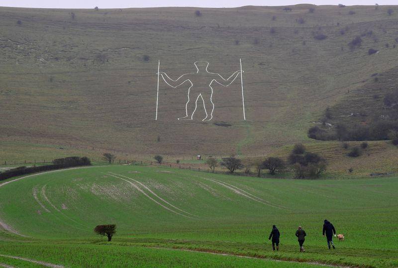 COVID face mask painted on giant English chalk figure – Firstpost