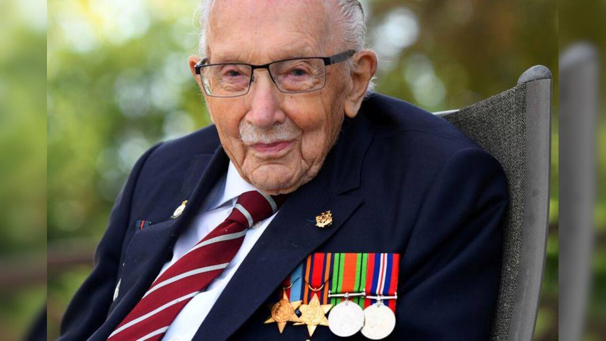 Britain's centenarian fundraiser Captain Tom in hospital with COVID-19 ...