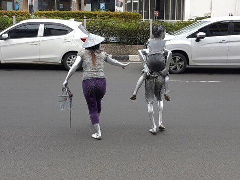 Indonesia's 'silver people' perform to make ends meet-World News ...