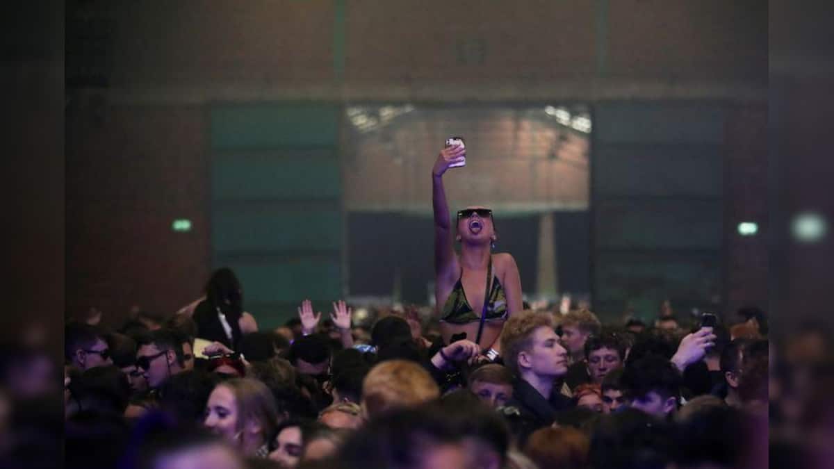 Thousands hit Liverpool rave in trial reopening from lockdown – Firstpost