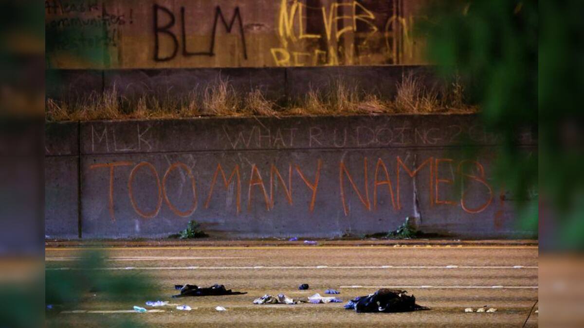 Two Seattle protesters hit by car on highway, one critically injured ...