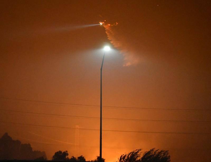 Wind-driven Los Angeles wildfire leaves 1 dead, forces 100,000 to flee ...
