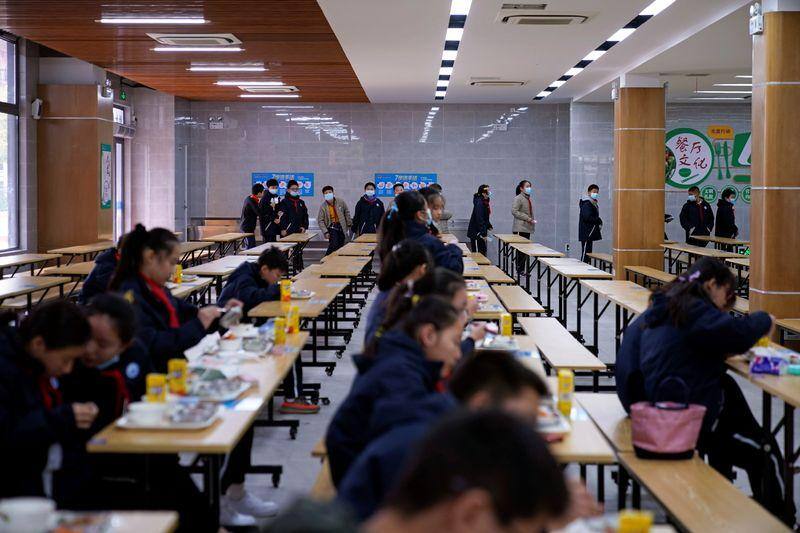 Robot chef serves Chinese school dinners to lower COVID-19 risk – Firstpost